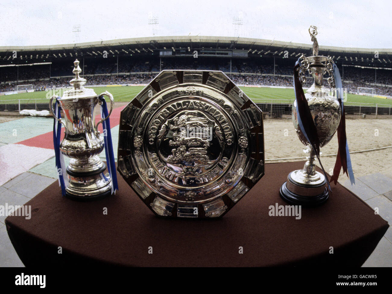 Fa charity shield and the first division league championship trophy hi ...