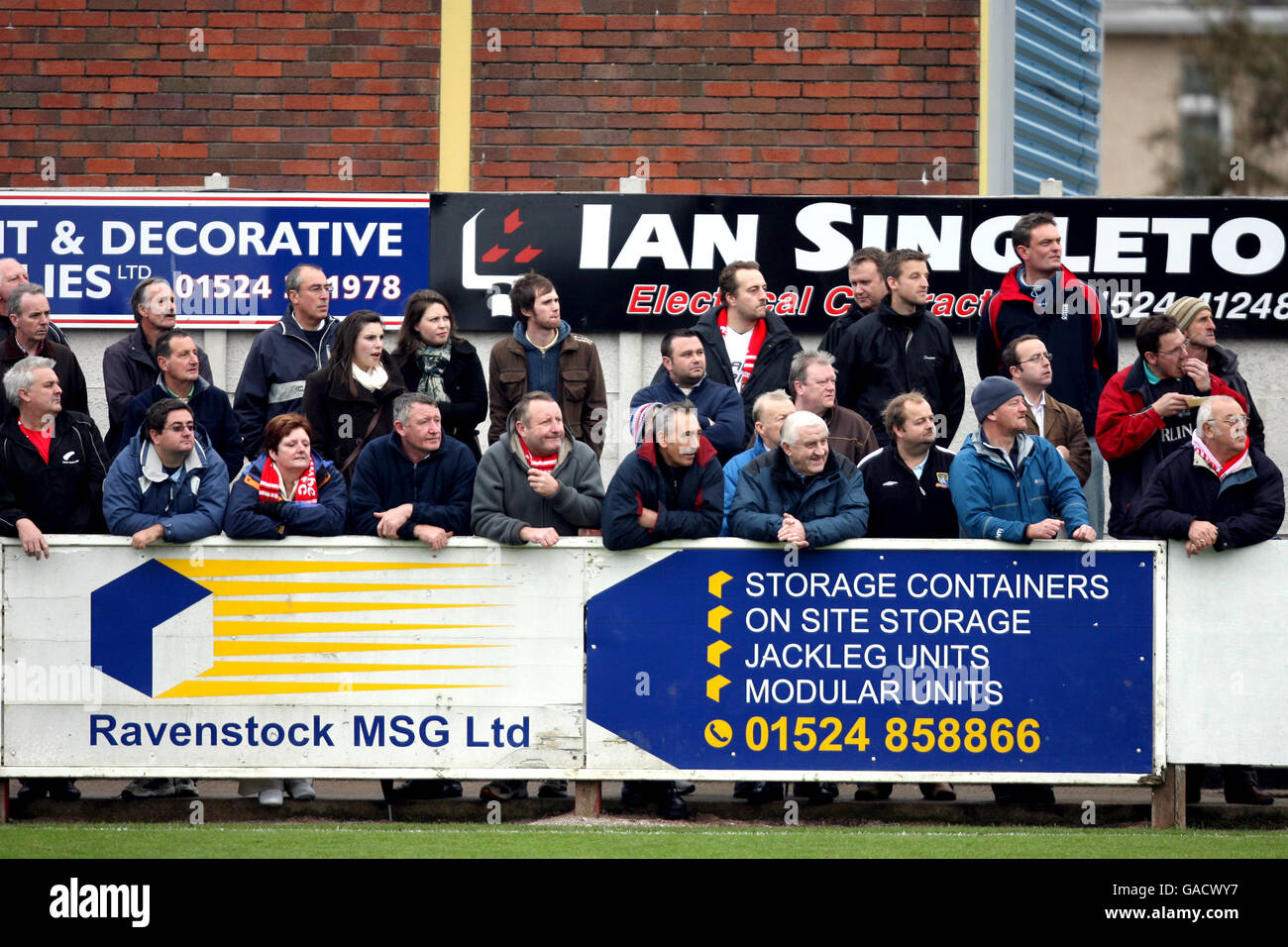 Morecambe fans soak up the atmosphere in the stands hi-res stock ...