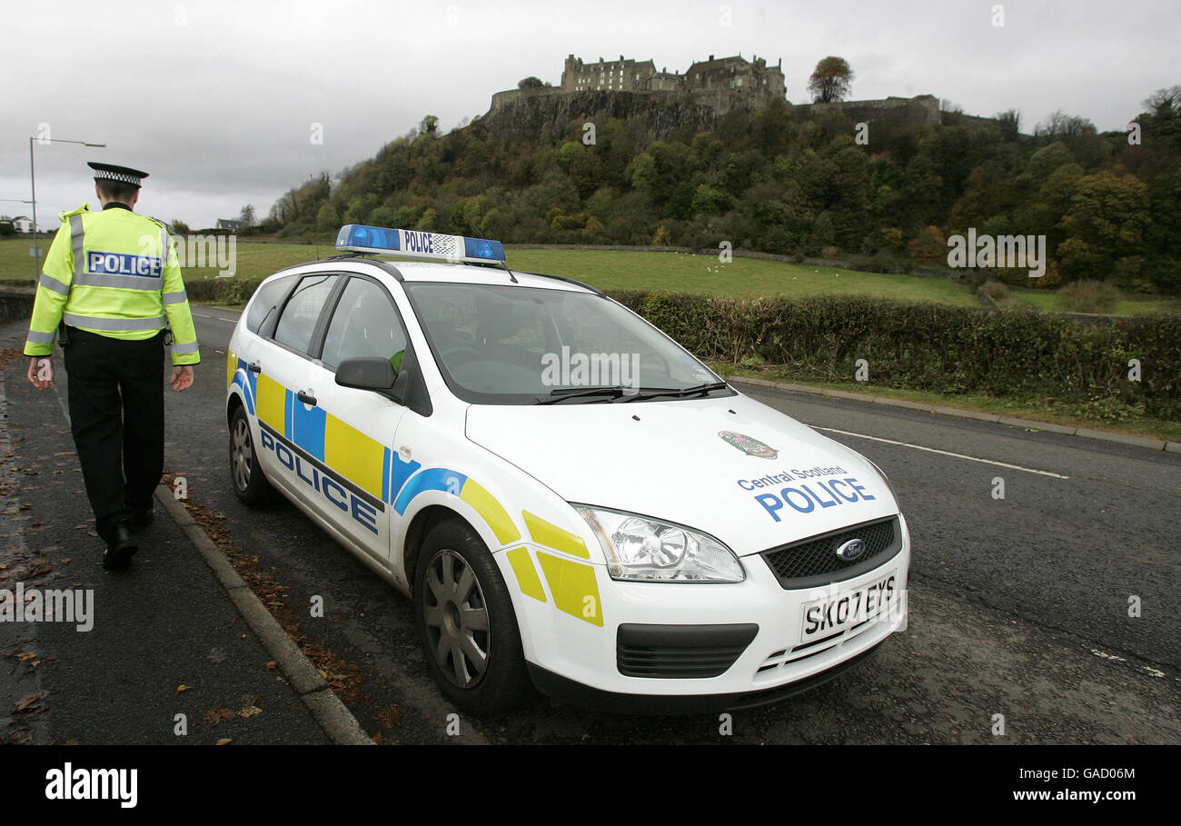 Central Scotland Police officer beside police car at Stirling Castle ...