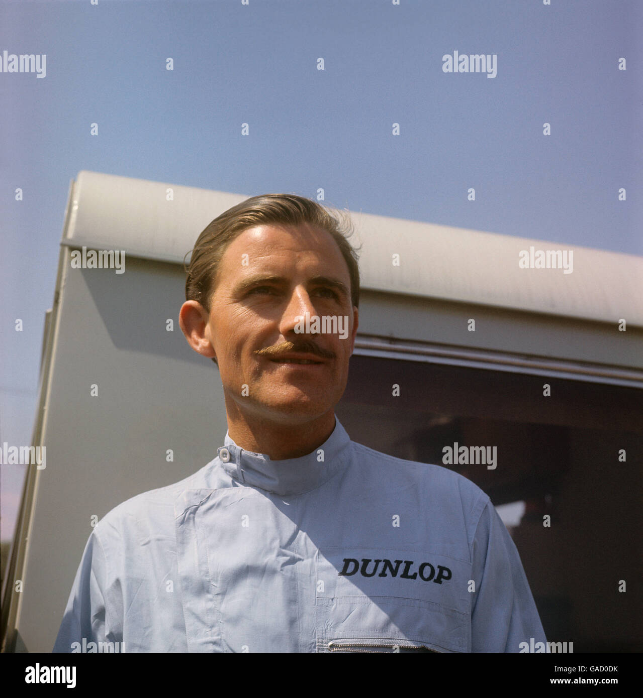 Study of british racing driver graham hill in racing overalls hi-res ...