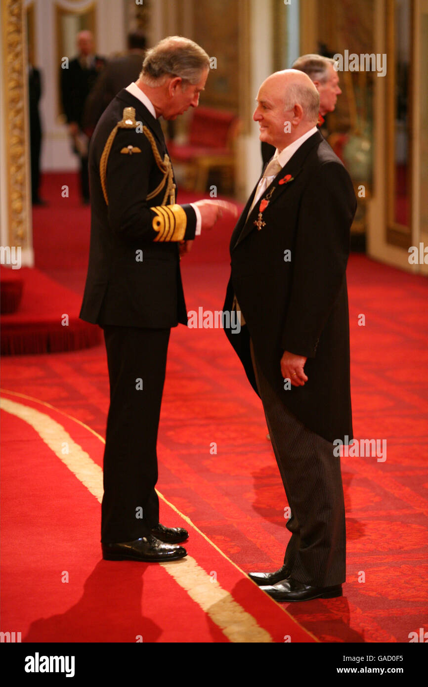 Mr. Graham Martin is made an MBE by the Prince of Wales at Buckingham ...
