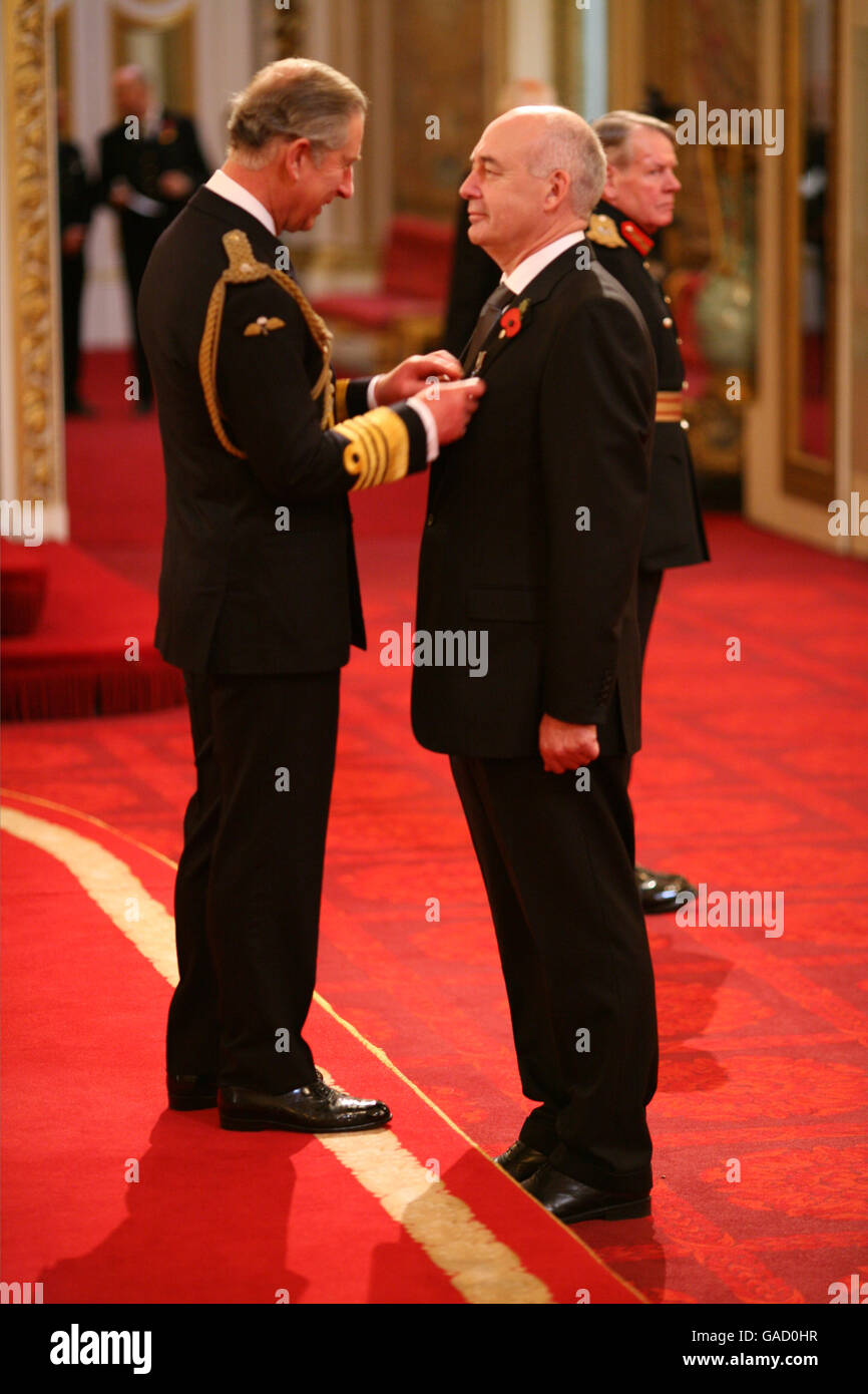 Mr. Barry Snelson is made an MBE by the Prince of Wales at Buckingham ...