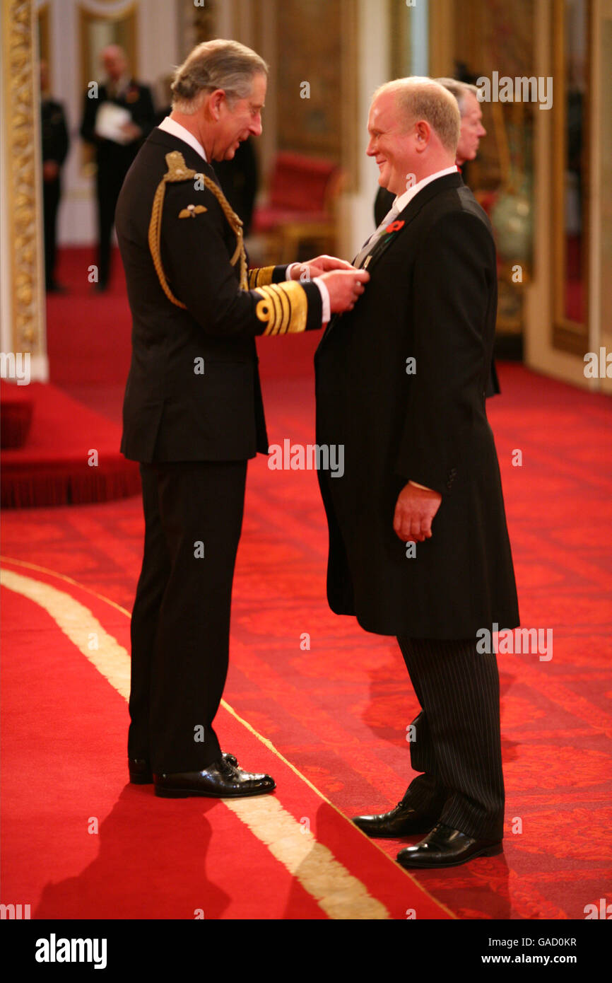 Mr. Samuel Templeman is made an MBE by the Prince of Wales at ...