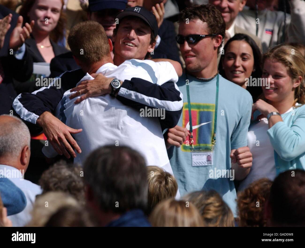 Tennis - Wimbledon 2002 - Men's Final. Lleyton Hewitt hugs his coach ...