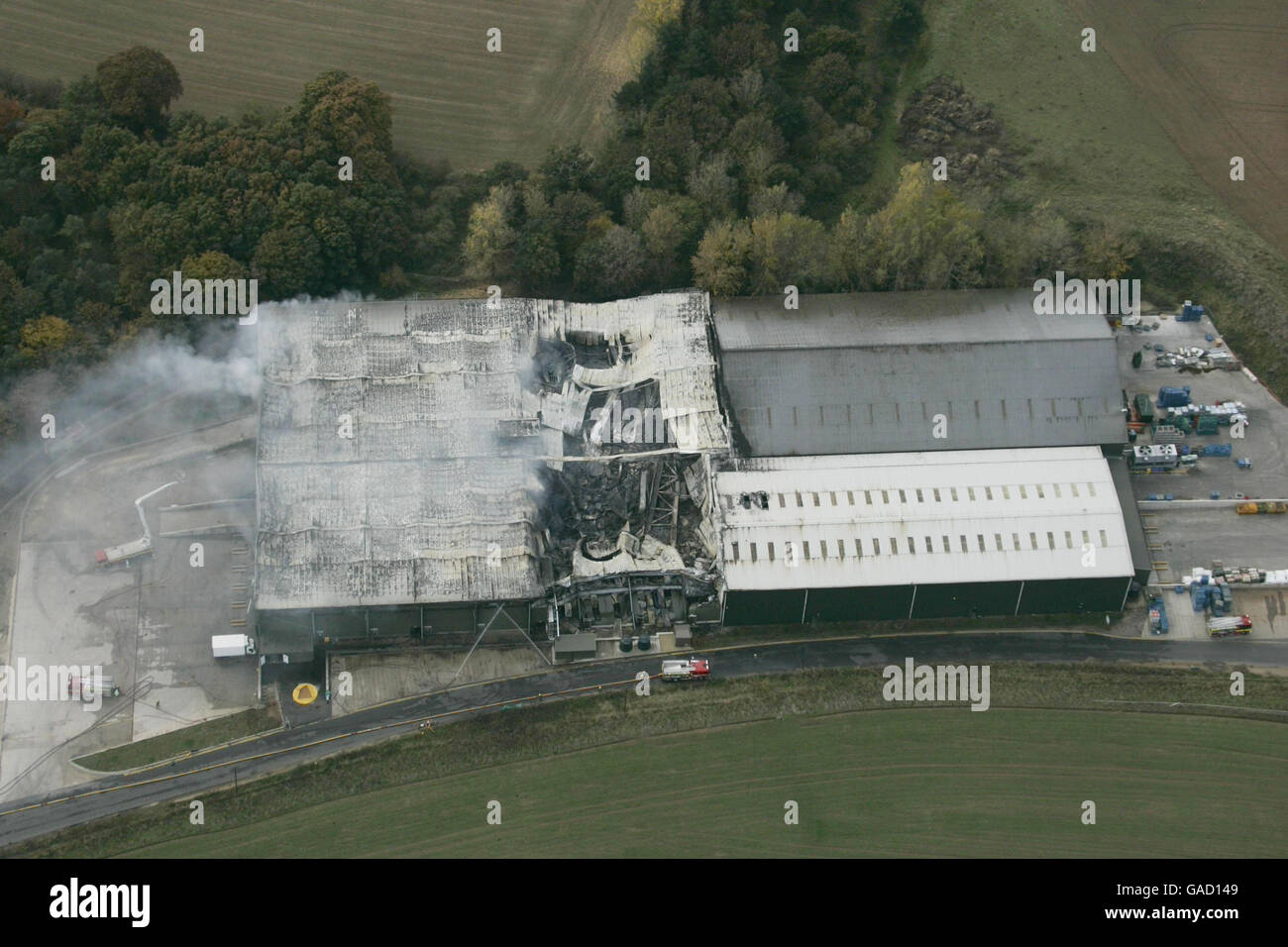 Aerial view of a fire burning at a warehouse on an industrial estate in ...