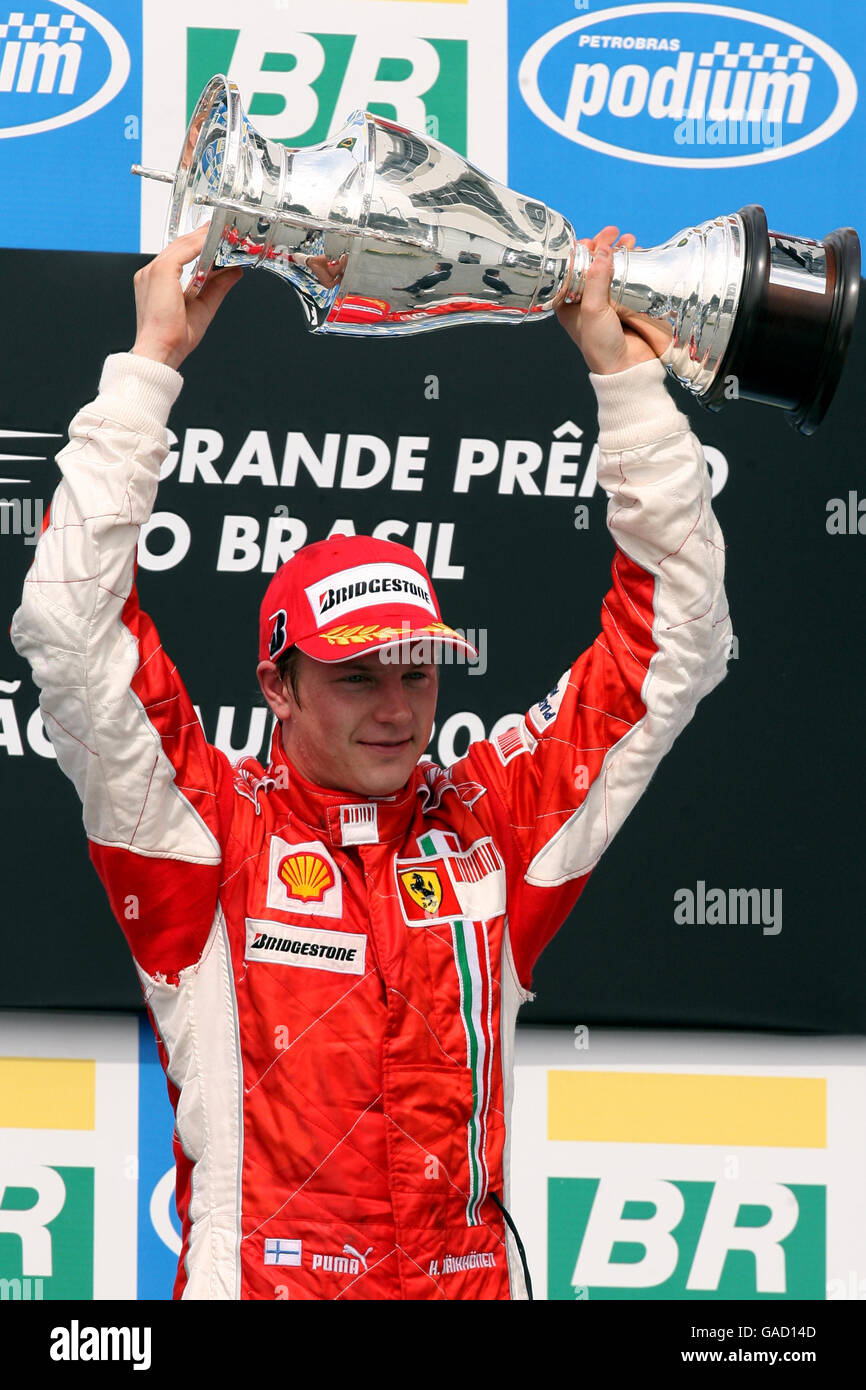 Ferrari's Kimi Raikkonen celebrates winning the Brazilian Grand Prix ...