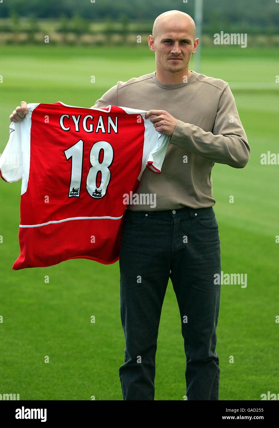Football - Pascal Cygan signs to Arsenal.. Pascal Cygan holds his new ...