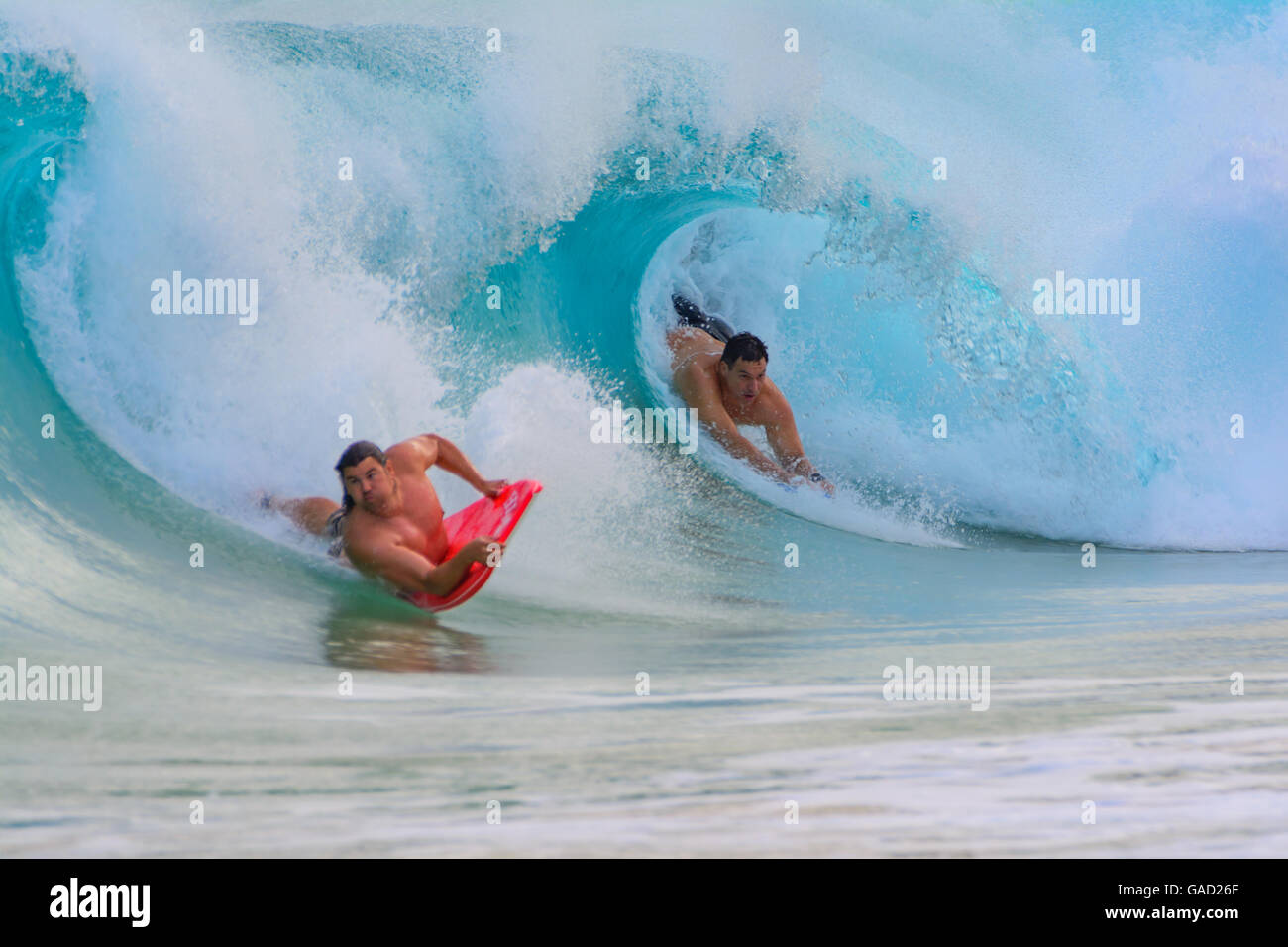 Boogie Boarder in the pipe as the wave breaks over him. Sandy Beach ...