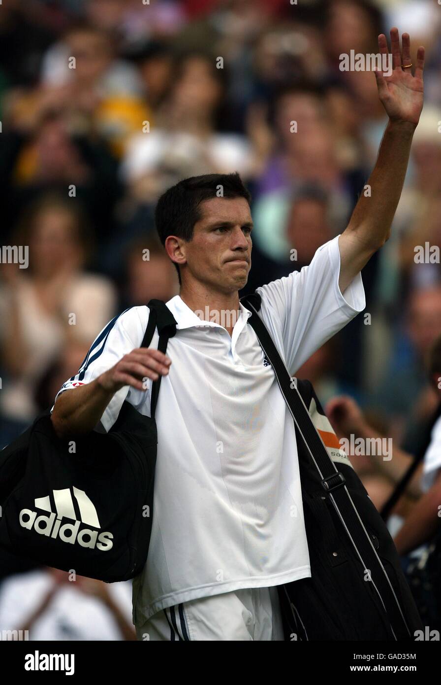 Tim Henman waves to the crowd as he walks off after losing against ...
