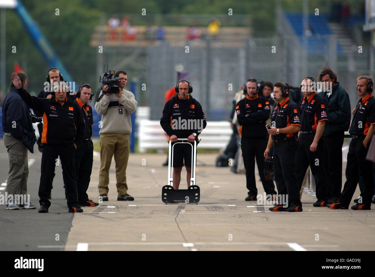 The Arrow team wait for the arrival of their cars first runout of the ...