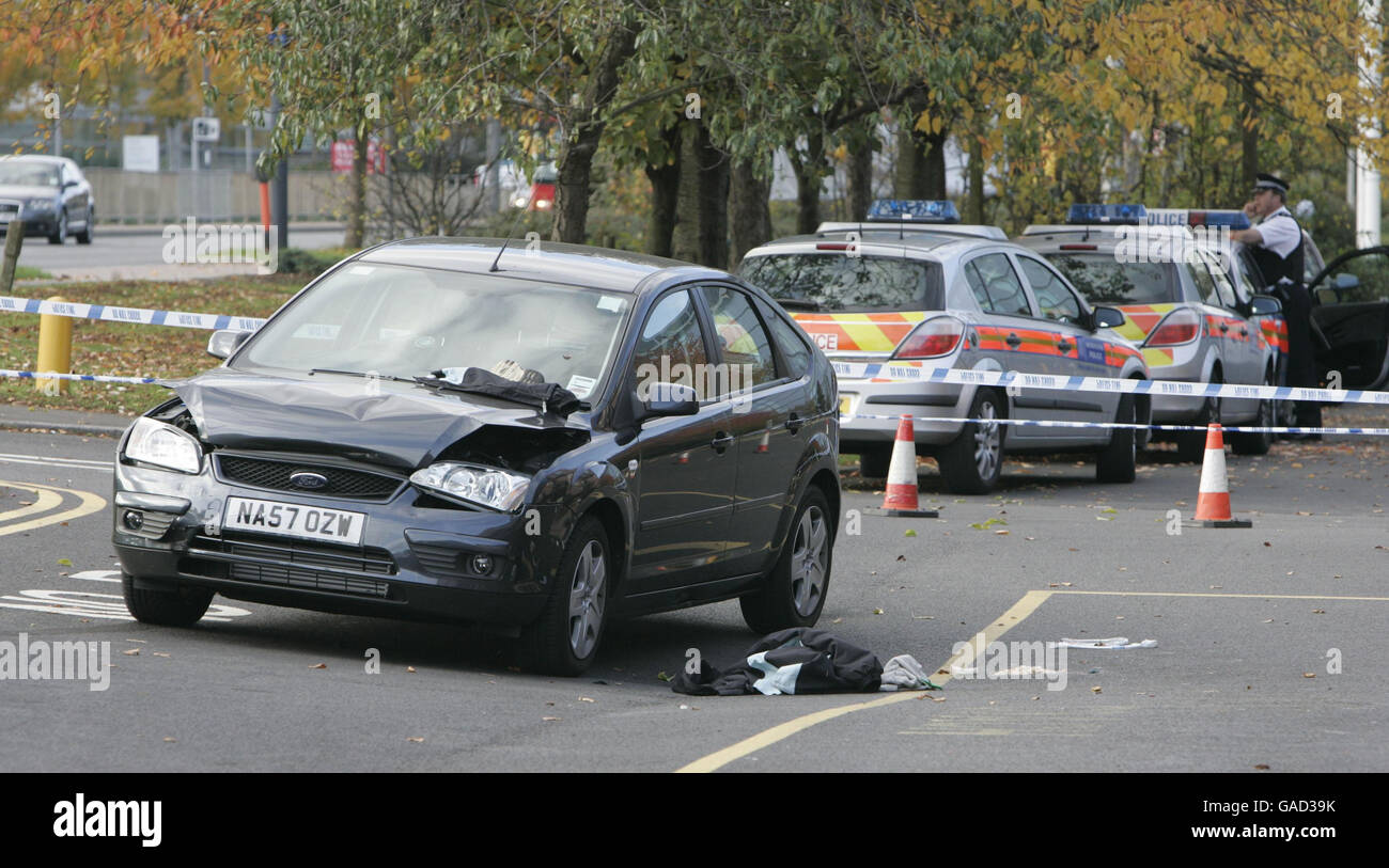 Police officer hit by car Stock Photo - Alamy