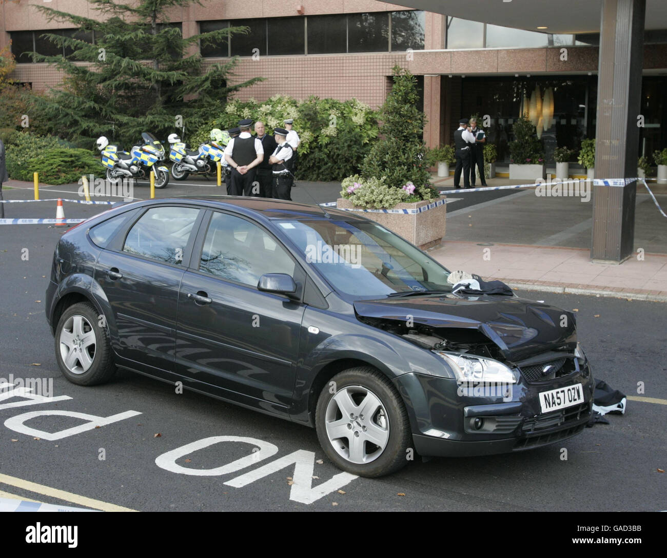 Police officer hit by car Stock Photo - Alamy