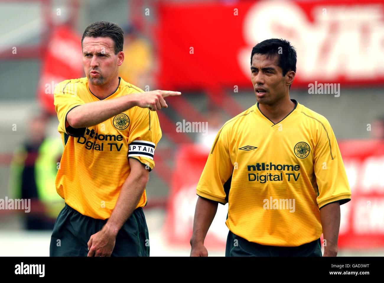 Celtic's Paul Lambert (l) and Bobby Petta (r) line up in a defensive ...