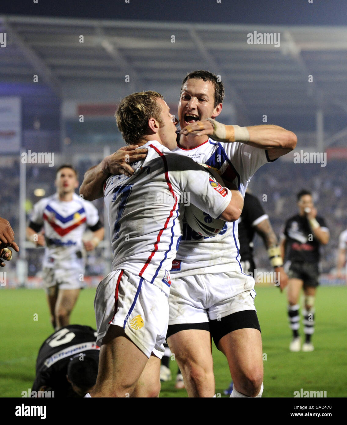 Great Britain's Rob Burrow (left) celebrates his try during the Second ...