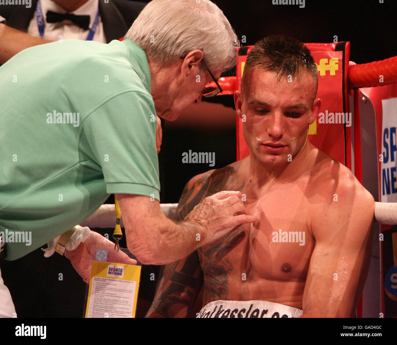 Denmark's Mikkel Kessler listens to instructions during the WBO/WBA/WBC ...