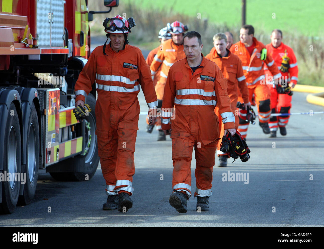 Search and rescue teams arrive to the warehouse for the three missing ...