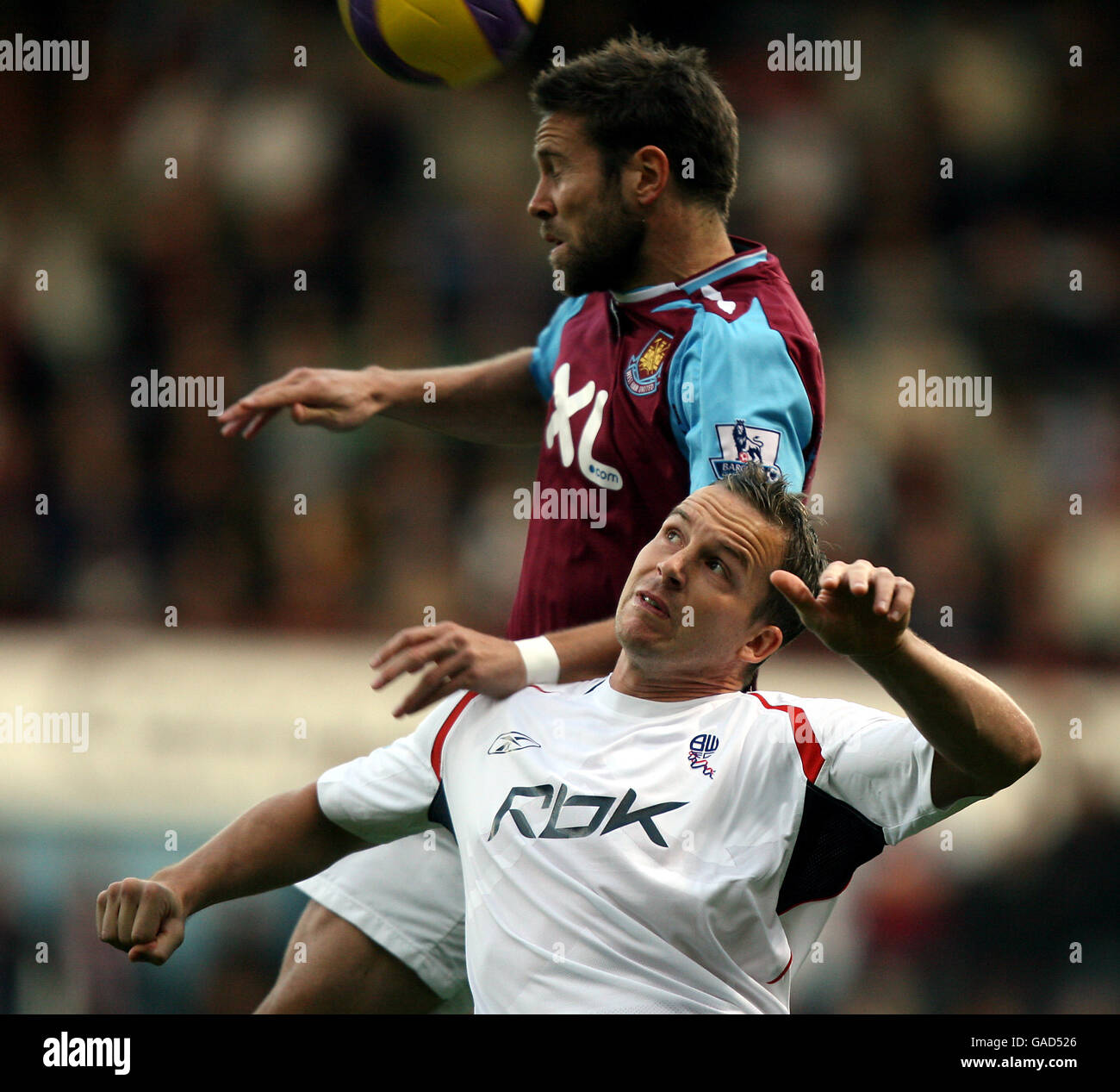West Ham United's Matthew Upson and Bolton Wanderers' Kevin Davies ...