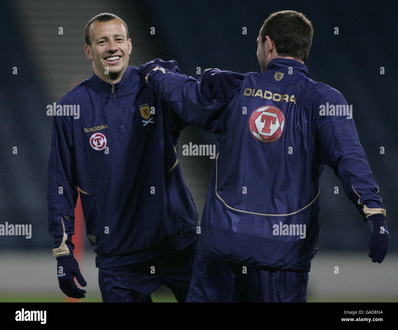 Scotland players Alan Hutton (left) with Kris Boyd (right) during a ...
