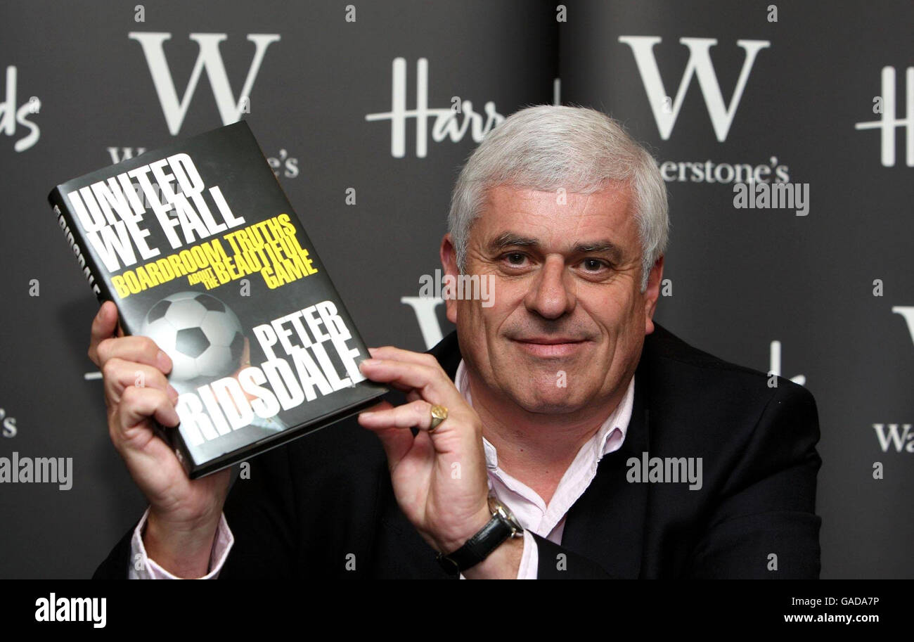 Former Leeds United Chairman Peter Ridsdale signs copies of his new ...