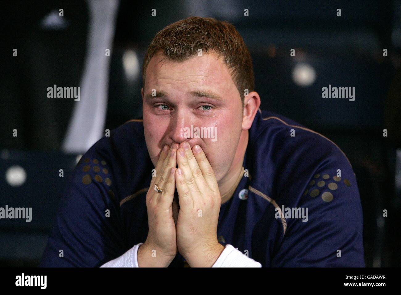 A dejected Scotland fan shows his emotion as his side fail to qualify ...