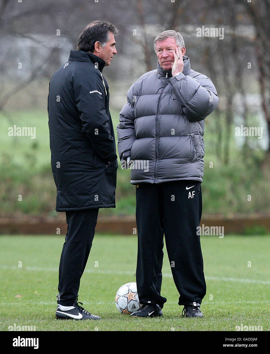 Manchester United's manager Sir Alex Ferguson with his assistant Carlos ...