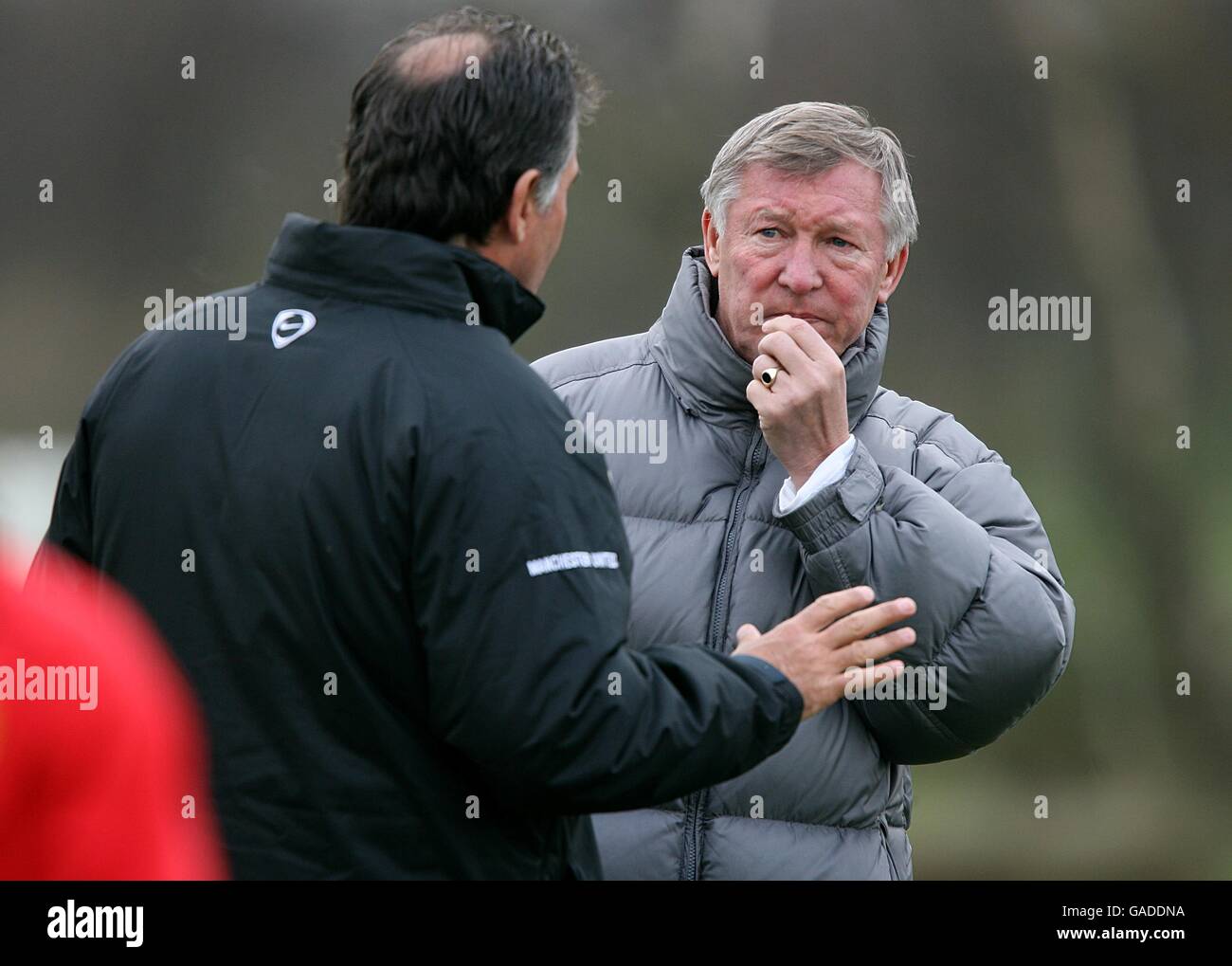 Manchester United's manager Sir Alex Ferguson and his assistant Carlos ...