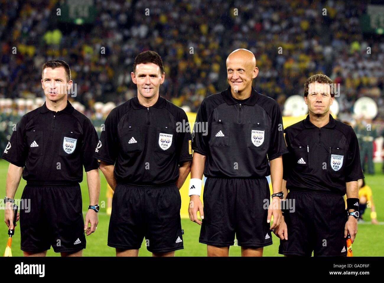 (L-R) The match officials Philip Sharp, Hugh Dallas, Pierluigi Collina ...