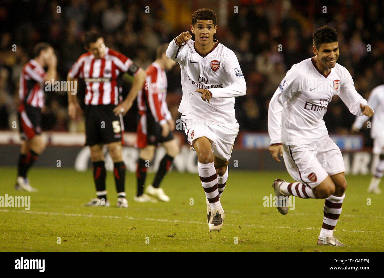 Arsenal's Denilson celebrates scoring their third goal during the ...