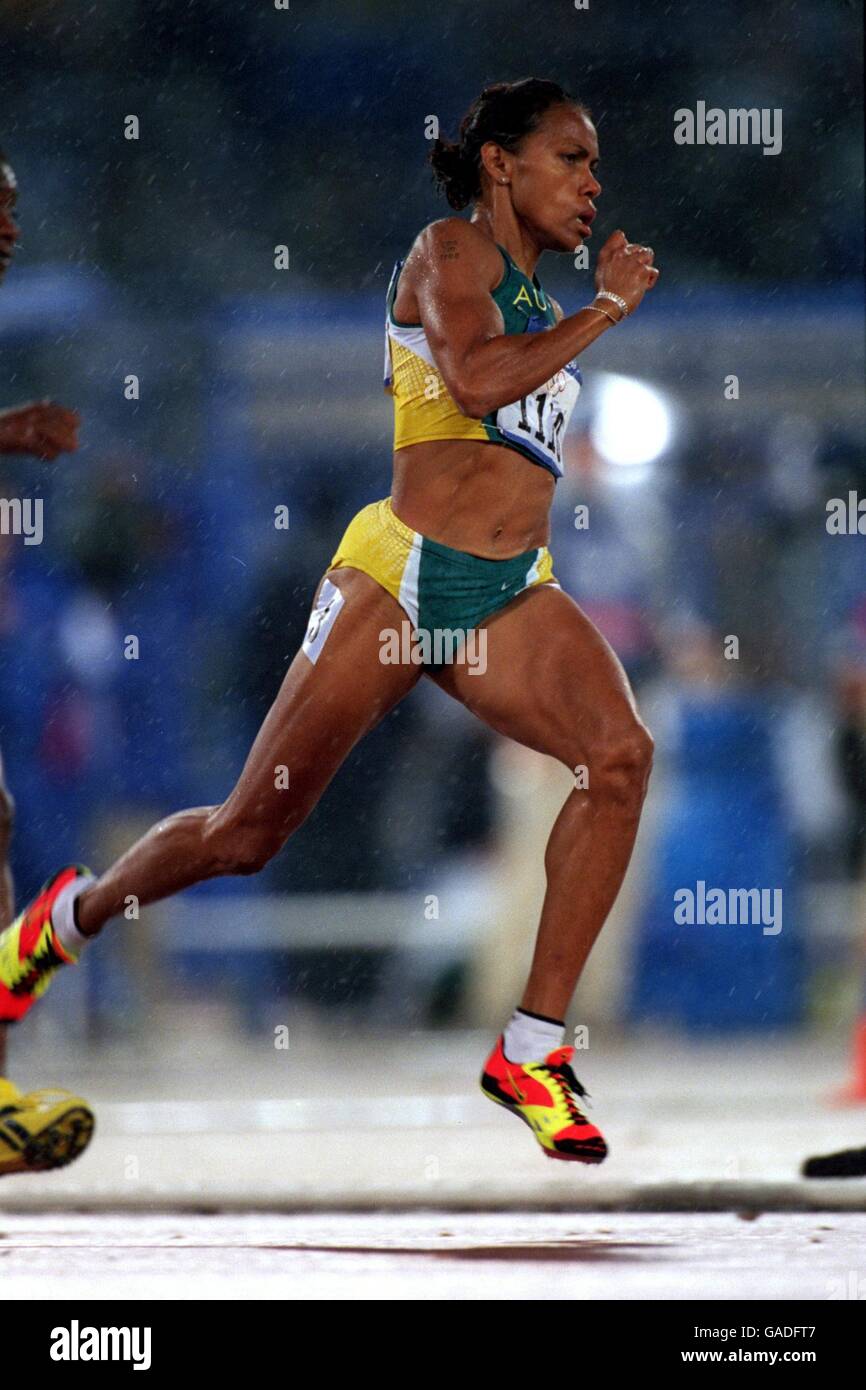 Australias cathy freeman in action during the womens 400m hi-res stock ...