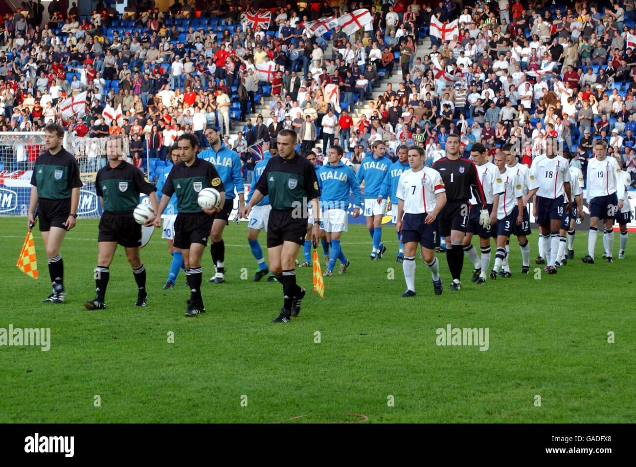 Italy and England are led onto the pitch by the officials Stock Photo ...