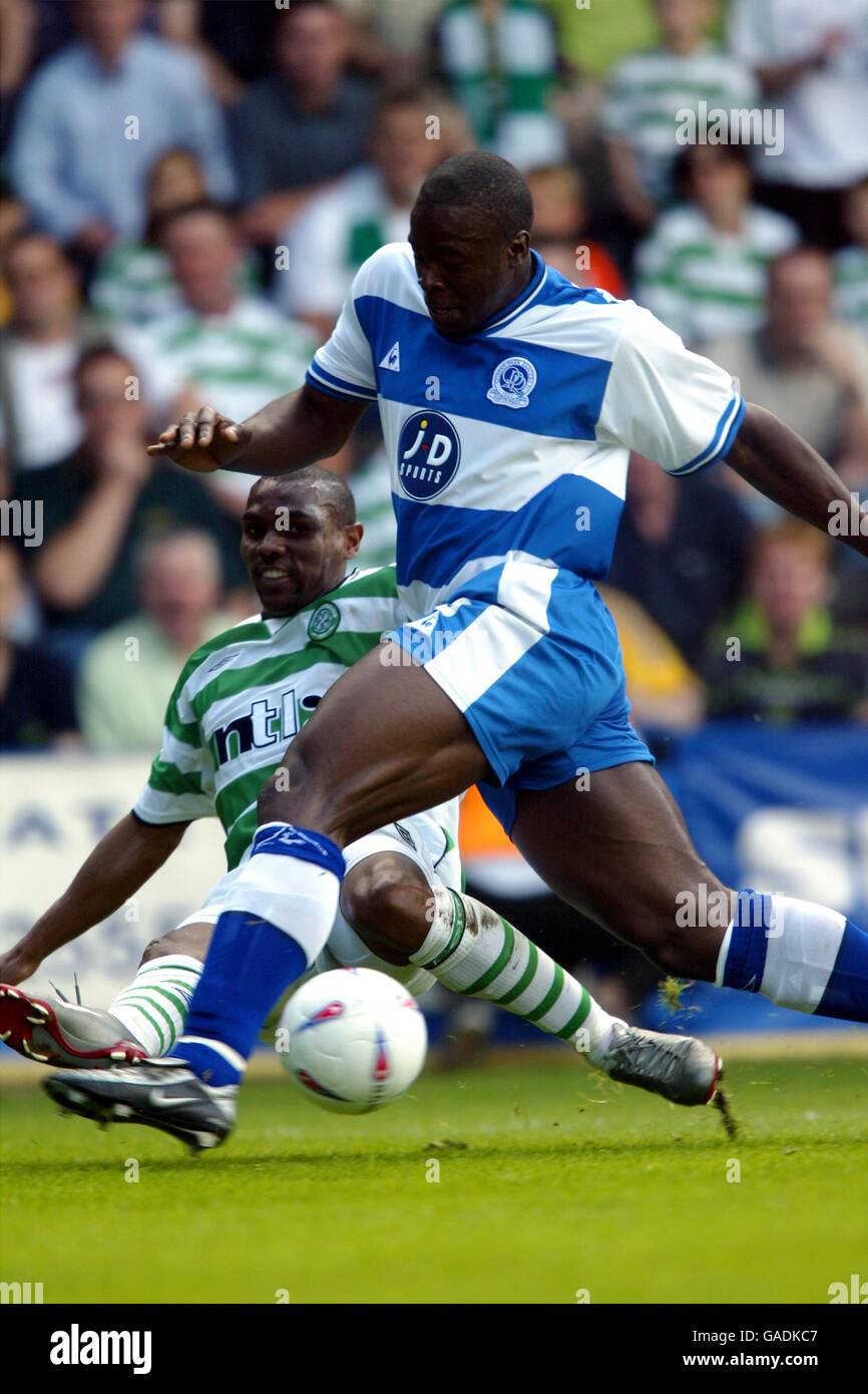 Queens Park Rangers' Daniel Shittu (r) is challenged by Celtic's Didier ...