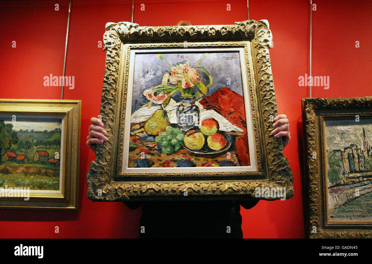 Moira Gow of auction house Lyon & Turnbull holds up Still Life with ...