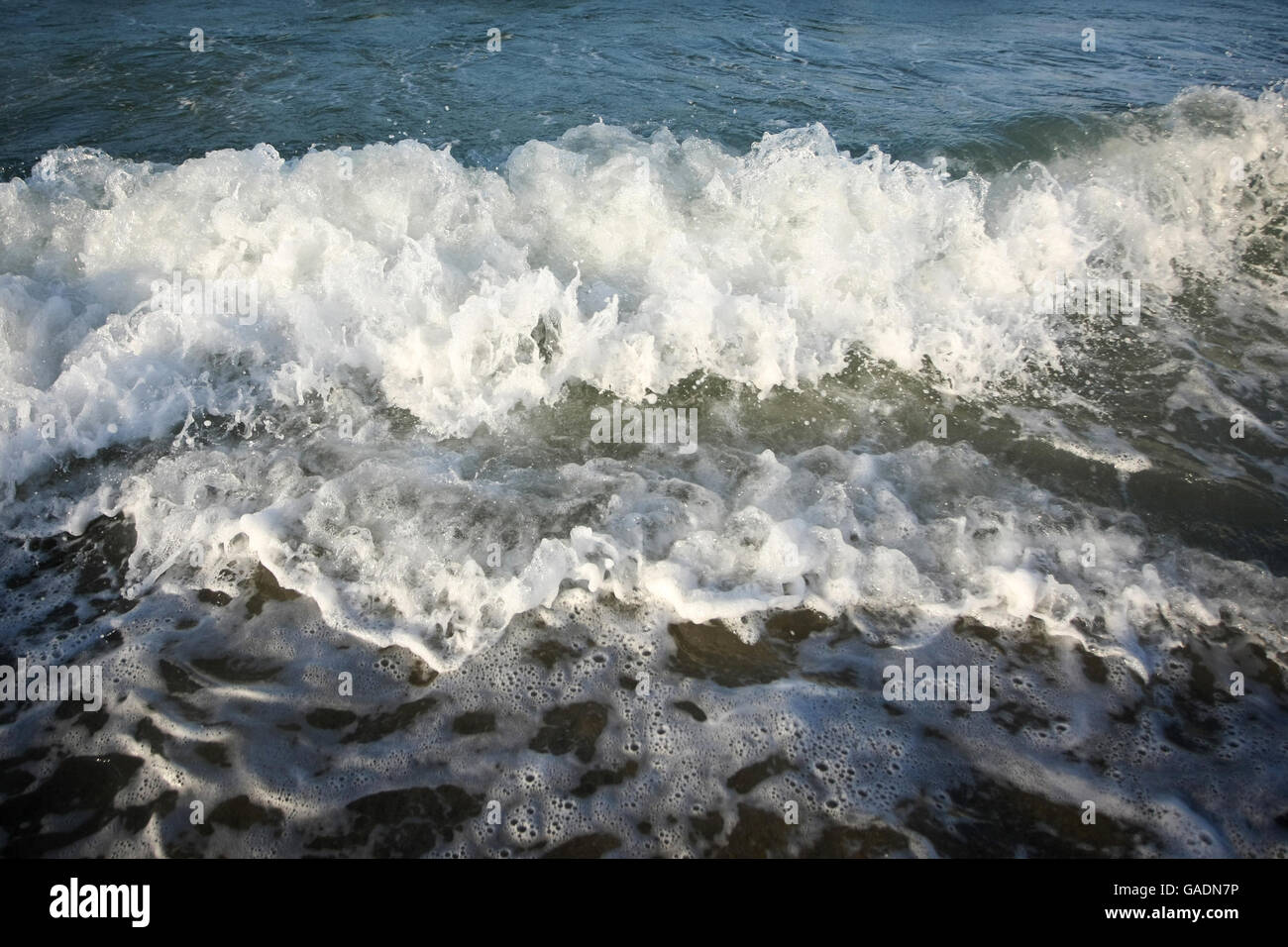 Wave breaks on sand hi-res stock photography and images - Alamy