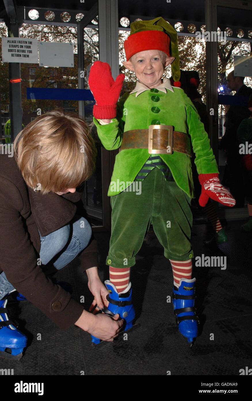 Fred Claus Elves Photocall - London Stock Photo - Alamy