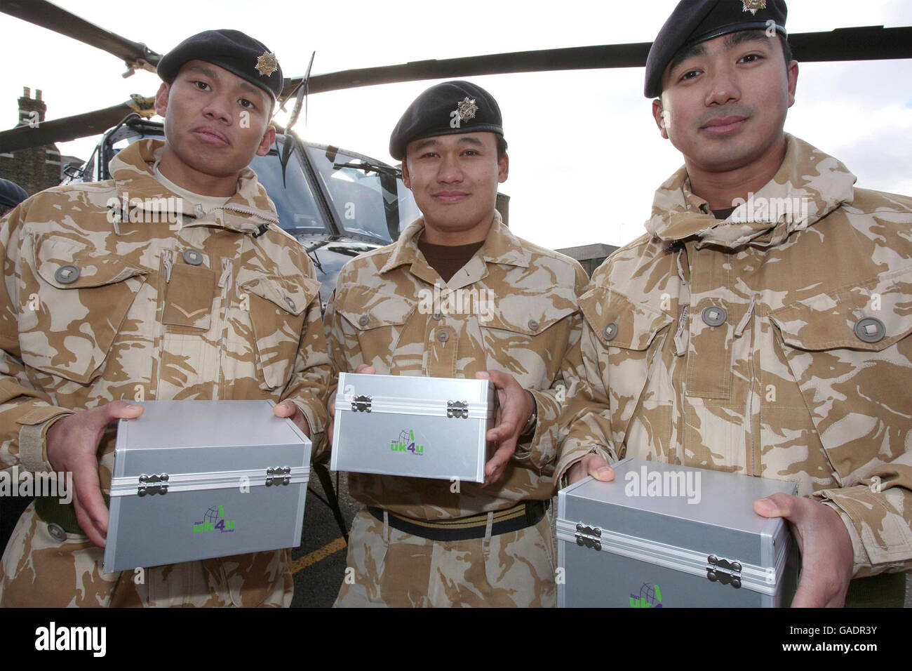 Members of 9 Supply Regiment, Royal Logistics Corp help to load a ...