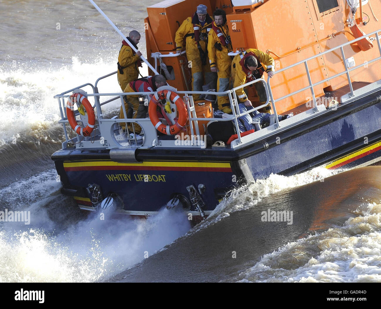 Whitby Lifeboat crew return after rescuing the crew of a small boat ...