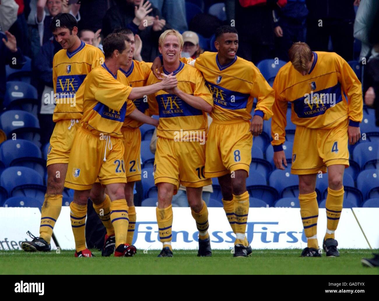 Mansfield Town's Craig Disley (no 10) celebrates scoring their second ...