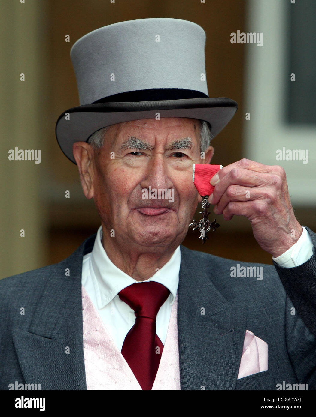 Actor Bill Pertwee after receiving his MBE from Britain's Queen ...