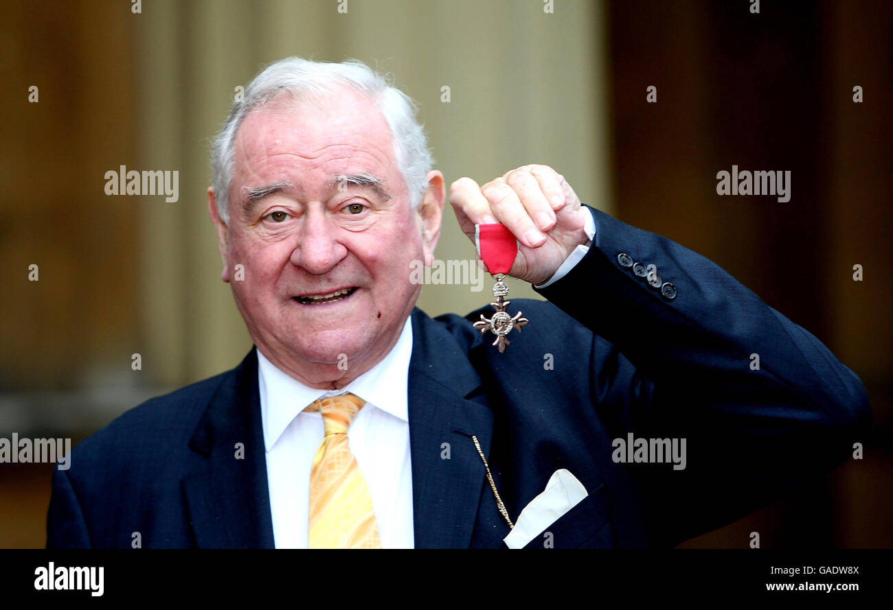 Actor George Baker after receiving his MBE from Britain's Queen ...
