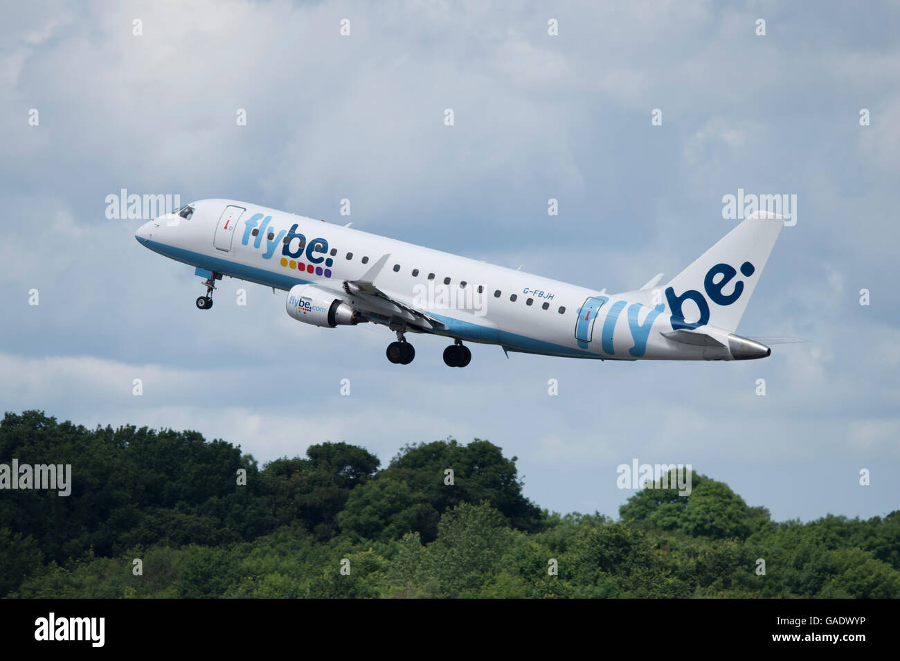 A Flybe Embraer 175 takes off from Manchester International Airport ...