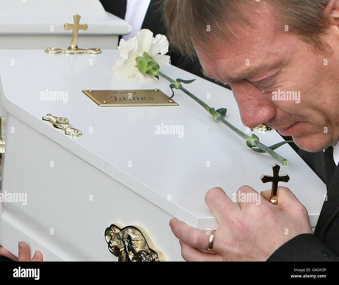 Carries nine month old baby james coffin hi-res stock photography and ...