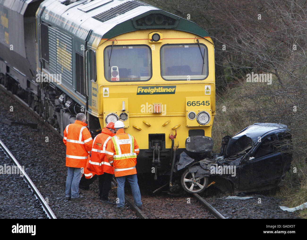 Car hit by freight train Stock Photo - Alamy