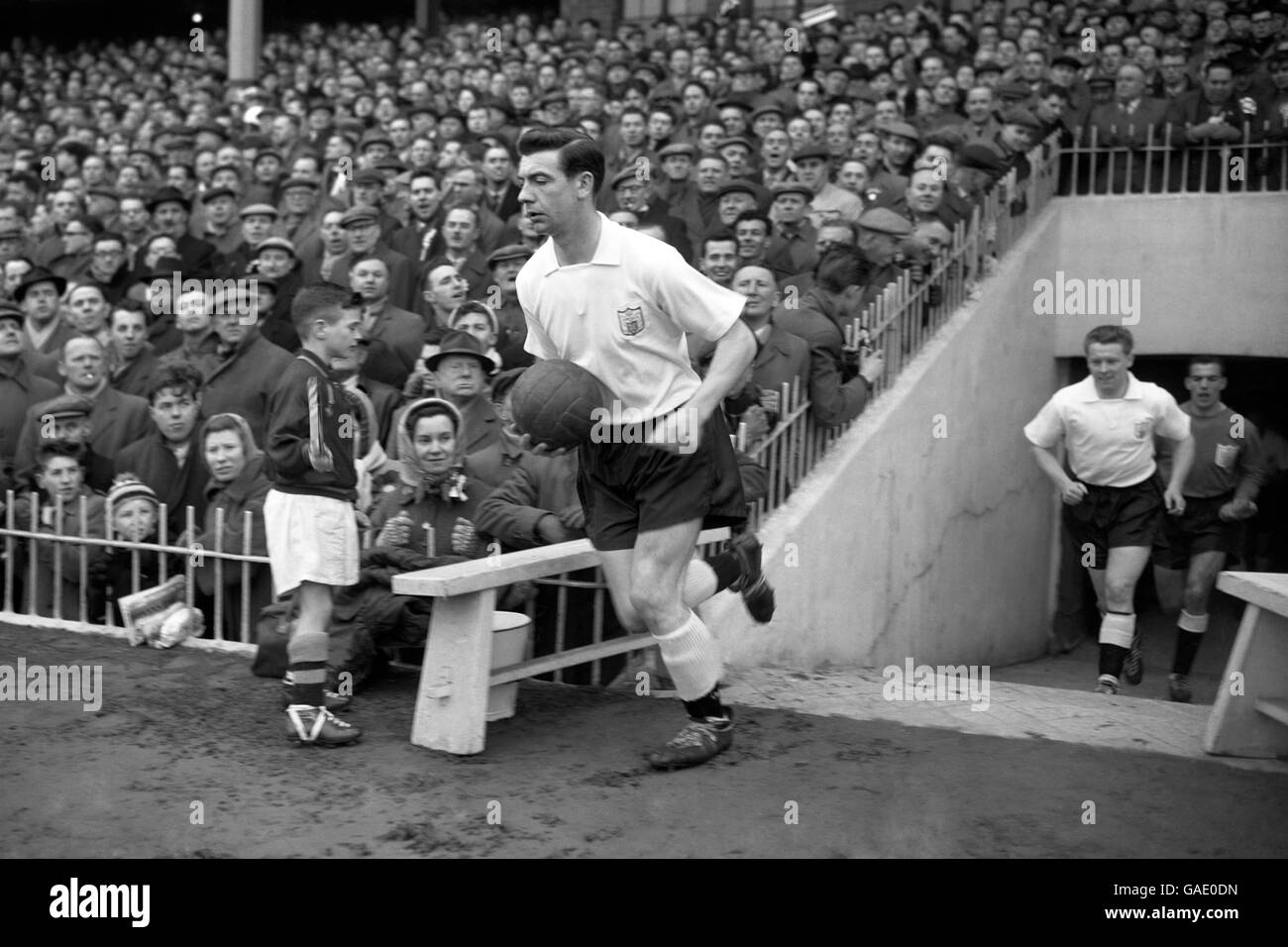 Johnny Haynes, Fulham's captain leading his team out Stock Photo - Alamy