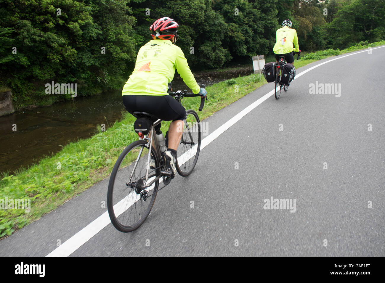 Japanese woman riding bicycle hi-res stock photography and images - Alamy