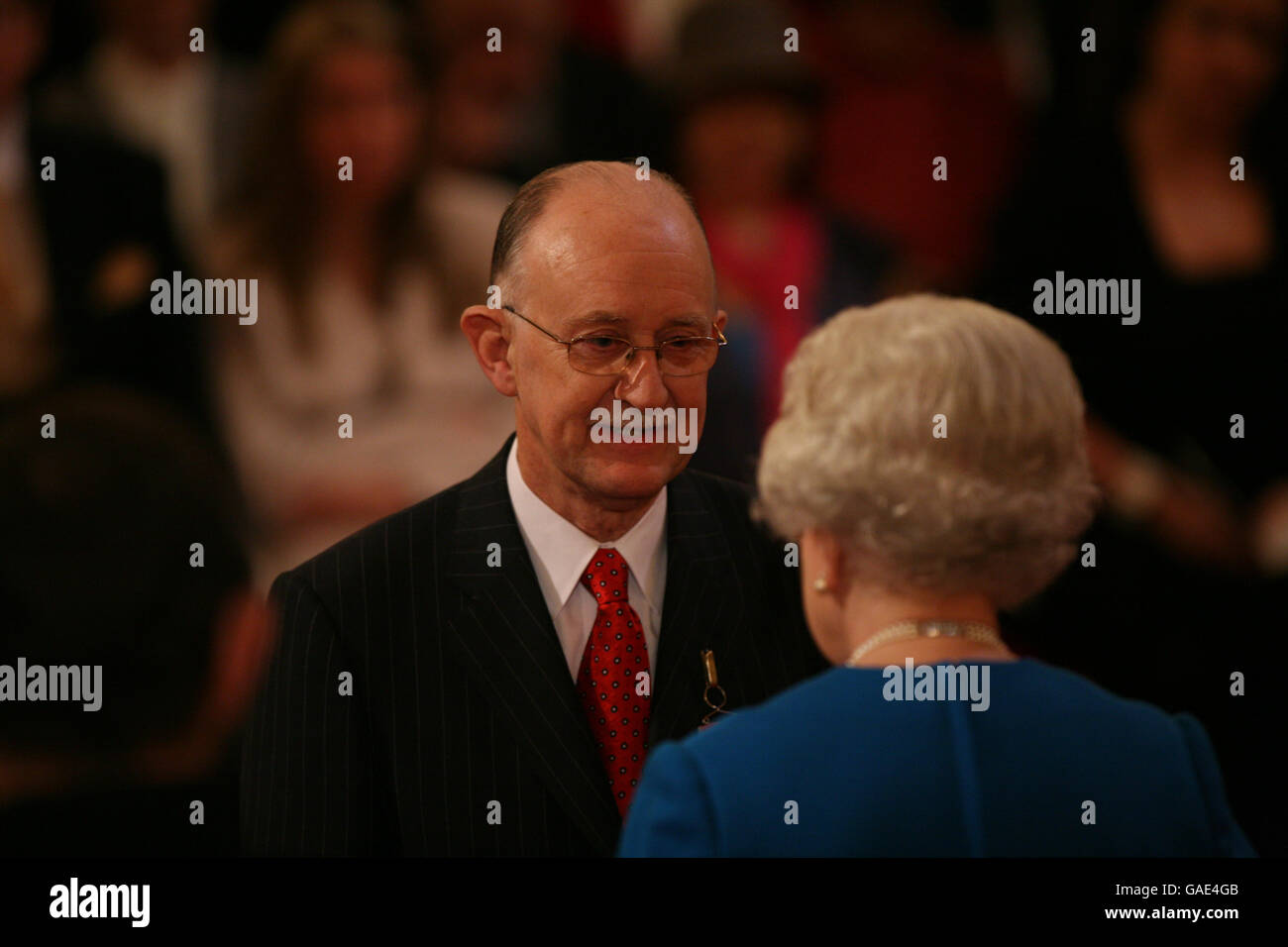 Mr. Alan Bradbury from Manchester is made an MBE by The Queen at ...