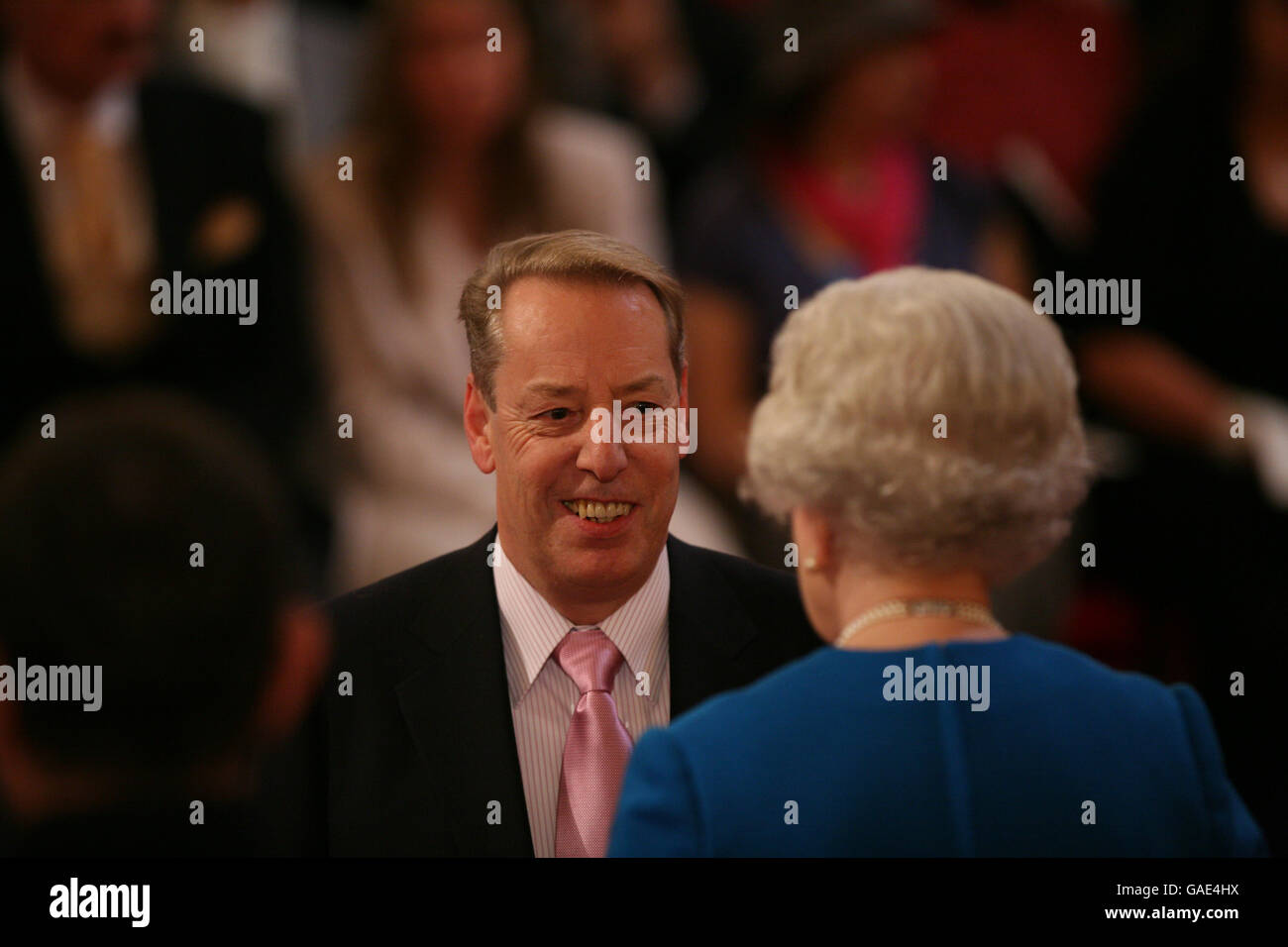 Mr. Clifford Harris from Cheam is made an MBE by The Queen at ...