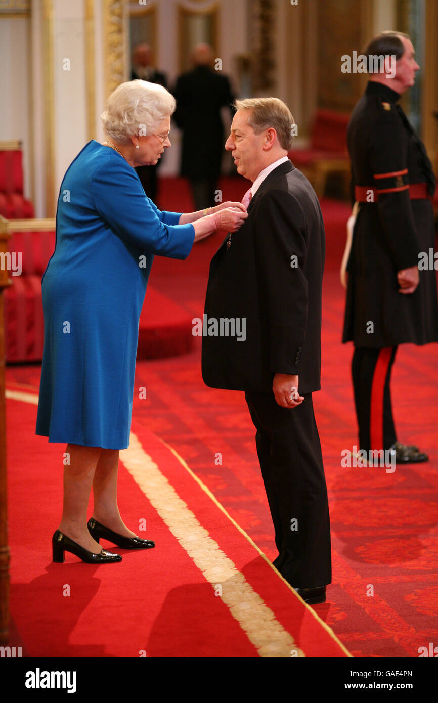 Mr. Clifford Harris from Cheam is made an MBE by The Queen at ...