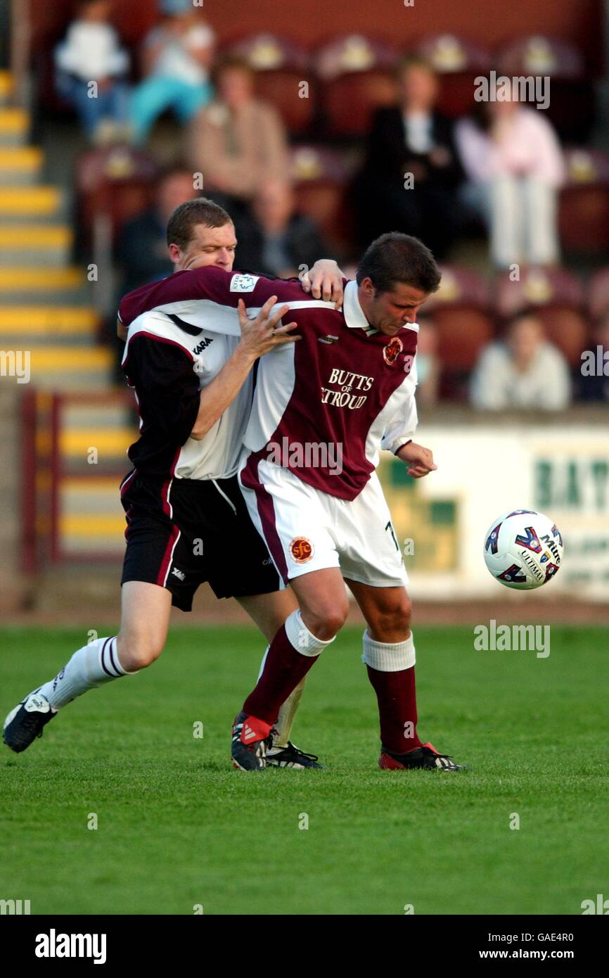 Stenhousemuirs david mcfarlane tackled by motherwells martyn corrigan ...