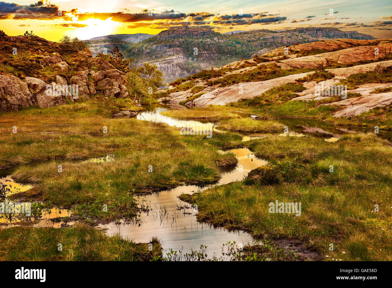 Sunset over mountains in the summer in Norway Stock Photo - Alamy