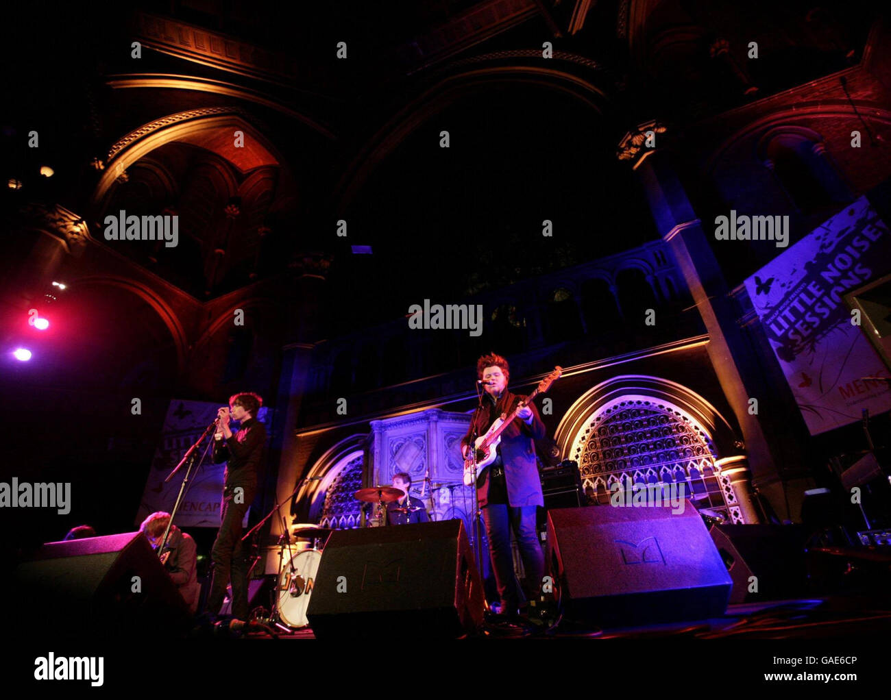 Joe Lean & The Jing Jang Jong performing on stage at the Union Chapel ...